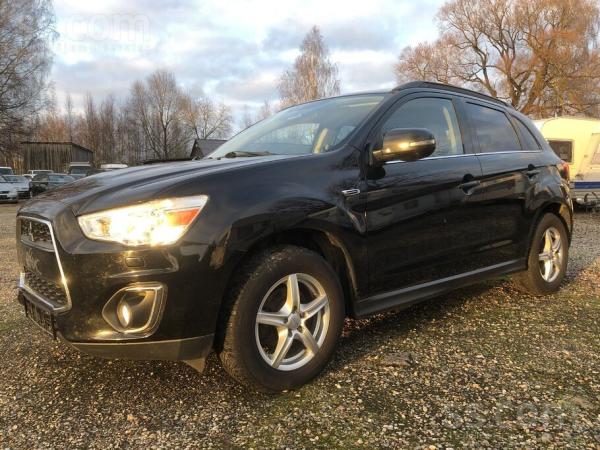 Black Mitsubishi ASX 2012 in Valmiera, with an engine capacity of 1.80 L and mileage of 141 thousand km for 6590 €, photo 2 on AUTOMOTO.COM.LV