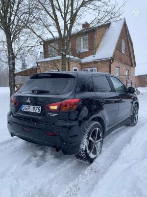 Black Mitsubishi ASX 2012 in Kelme, with an engine capacity of 2.00 L and mileage of 158 thousand km for 4750 €, photo 3 on AUTOMOTO.COM.LV