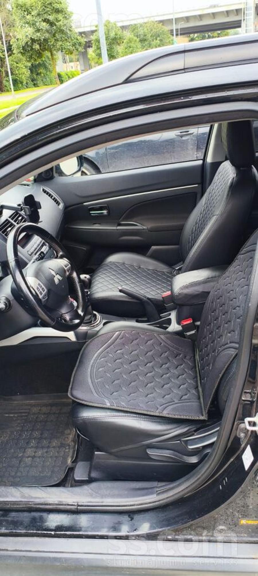 Melns Mitsubishi ASX 2012 Rīga, ar dzinēja tilpumu 1.80 L un nobraukumu 128 tūkst. km par 4800 €, foto 10 vietnē AUTOMOTO.COM.LV