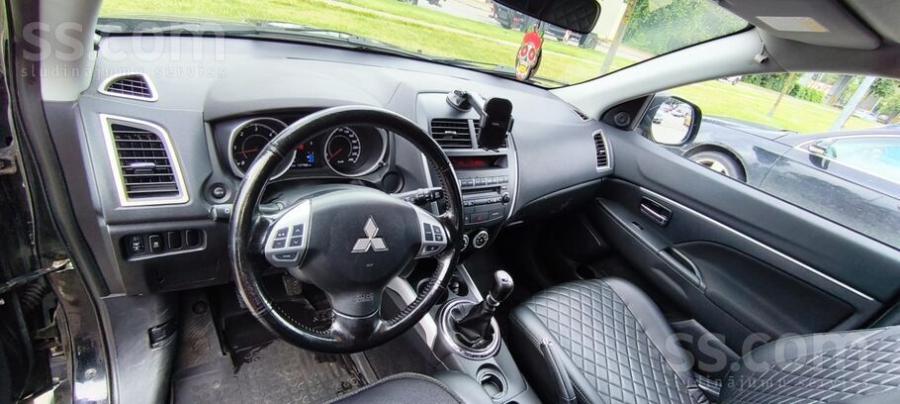 Melns Mitsubishi ASX 2012 Rīga, ar dzinēja tilpumu 1.80 L un nobraukumu 128 tūkst. km par 4800 €, foto 11 vietnē AUTOMOTO.COM.LV