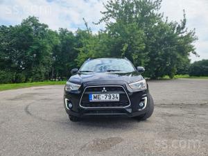 Black Mitsubishi ASX 2015 in Riga, with an engine capacity of 2.20 L and mileage of 260 thousand km for 7450 €, photo 3 on AUTOMOTO.COM.LV
