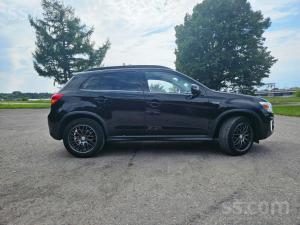 Black Mitsubishi ASX 2015 in Riga, with an engine capacity of 2.20 L and mileage of 260 thousand km for 7450 €, photo 5 on AUTOMOTO.COM.LV