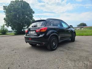 Black Mitsubishi ASX 2015 in Riga, with an engine capacity of 2.20 L and mileage of 260 thousand km for 7450 €, photo 6 on AUTOMOTO.COM.LV