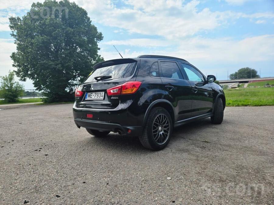 Black Mitsubishi ASX 2015 in Riga, with an engine capacity of 2.20 L and mileage of 260 thousand km for 7450 €, photo 6 on AUTOMOTO.COM.LV