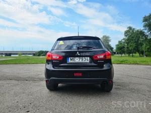 Black Mitsubishi ASX 2015 in Riga, with an engine capacity of 2.20 L and mileage of 260 thousand km for 7450 €, photo 7 on AUTOMOTO.COM.LV