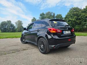 Black Mitsubishi ASX 2015 in Riga, with an engine capacity of 2.20 L and mileage of 260 thousand km for 7450 €, photo 8 on AUTOMOTO.COM.LV