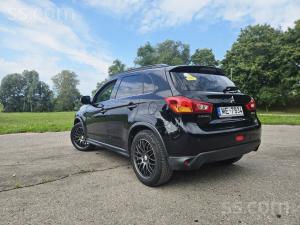 Melns Mitsubishi ASX 2015 Rīga, ar dzinēja tilpumu 2.20 L un nobraukumu 260 tūkst. km par 6990 €, foto 6 vietnē AUTOMOTO.COM.LV