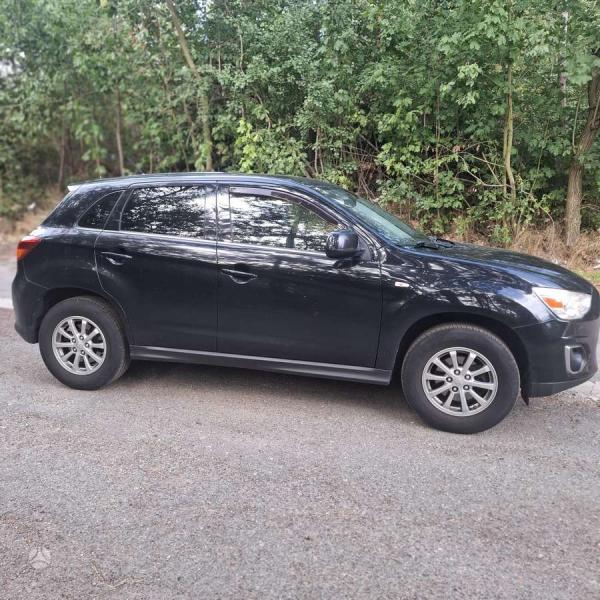 Black Mitsubishi ASX 2016 in Vilnius, with an engine capacity of 1.59 L and mileage of 282 thousand km for 5290 €, photo 9 on AUTOMOTO.COM.LV
