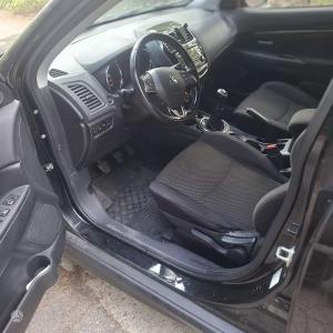 Black Mitsubishi ASX 2016 in Vilnius, with an engine capacity of 1.59 L and mileage of 282 thousand km for 5290 €, photo 12 on AUTOMOTO.COM.LV