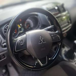Black Mitsubishi ASX 2016 in Vilnius, with an engine capacity of 1.59 L and mileage of 282 thousand km for 5290 €, photo 14 on AUTOMOTO.COM.LV