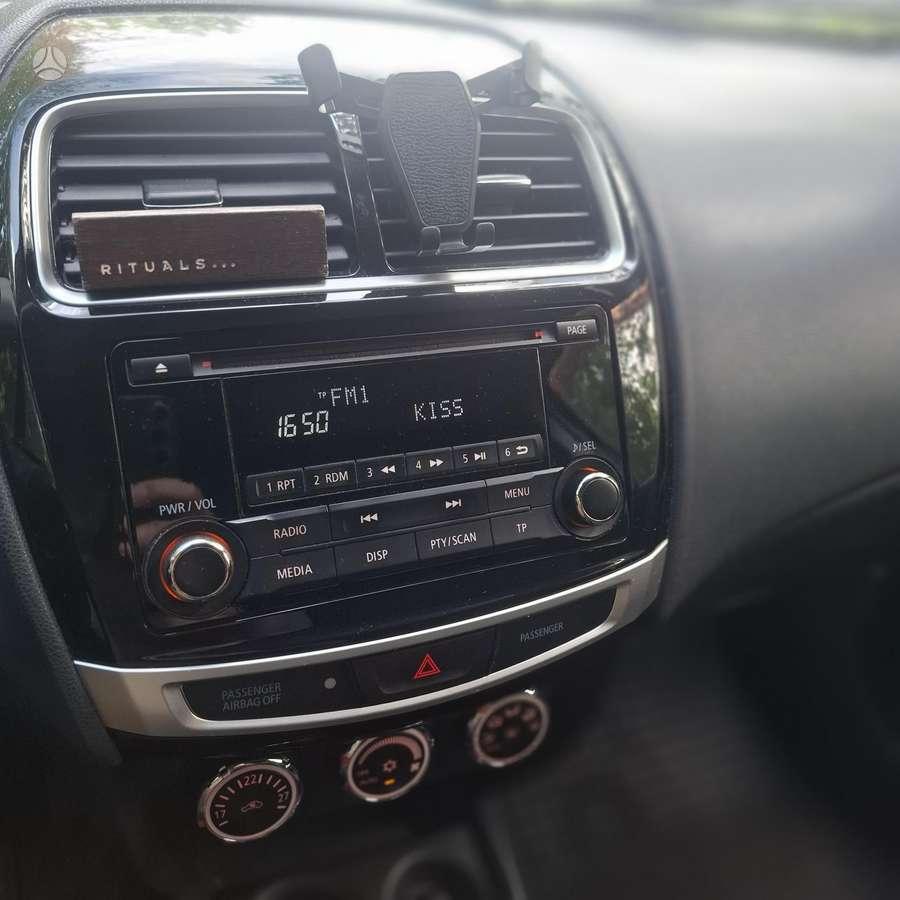 Black Mitsubishi ASX 2016 in Vilnius, with an engine capacity of 1.59 L and mileage of 282 thousand km for 5290 €, photo 18 on AUTOMOTO.COM.LV