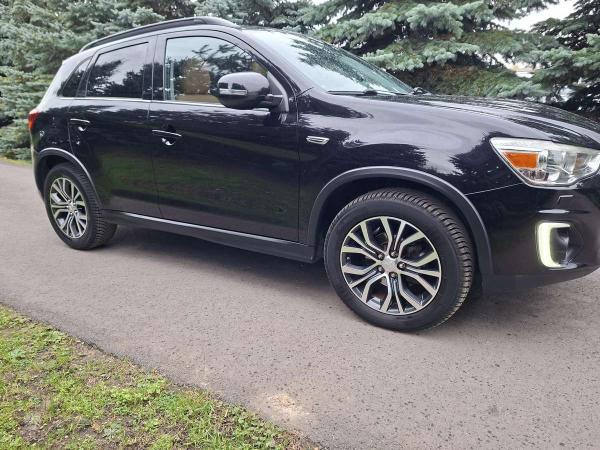 Black Mitsubishi ASX 2016 in Utena, with an engine capacity of 2.27 L and mileage of 170 thousand km for 7750 €, photo 7 on AUTOMOTO.COM.LV