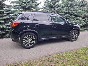 Black Mitsubishi ASX 2016 in Utena, with an engine capacity of 2.27 L and mileage of 170 thousand km for 7750 €, photo 8 on AUTOMOTO.COM.LV
