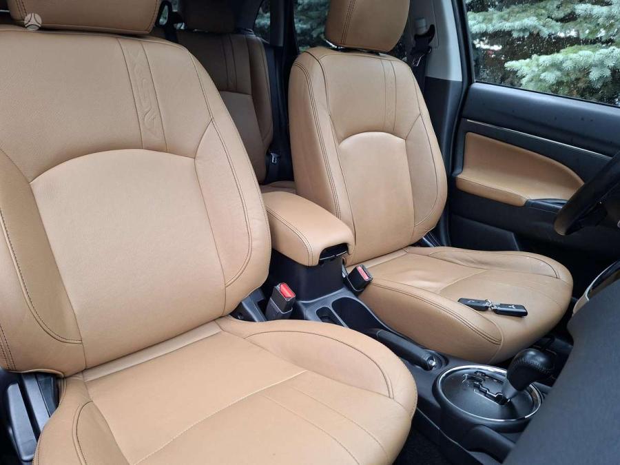 Black Mitsubishi ASX 2016 in Utena, with an engine capacity of 2.27 L and mileage of 170 thousand km for 7750 €, photo 26 on AUTOMOTO.COM.LV