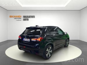 Black Mitsubishi ASX 2020 in Riga, with an engine capacity of 2.00 L and mileage of 90 thousand km for 14990 €, photo 7 on AUTOMOTO.COM.LV