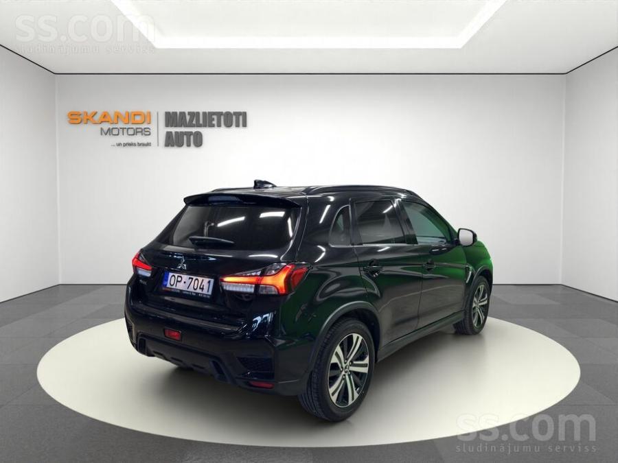 Black Mitsubishi ASX 2020 in Riga, with an engine capacity of 2.00 L and mileage of 90 thousand km for 14990 €, photo 7 on AUTOMOTO.COM.LV