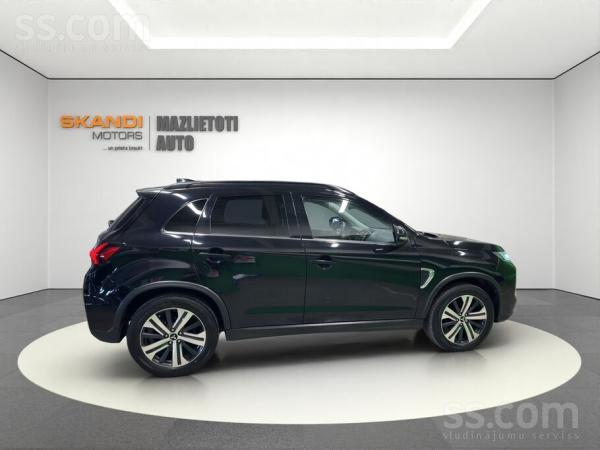 Black Mitsubishi ASX 2020 in Riga, with an engine capacity of 2.00 L and mileage of 90 thousand km for 14990 €, photo 7 on AUTOMOTO.COM.LV