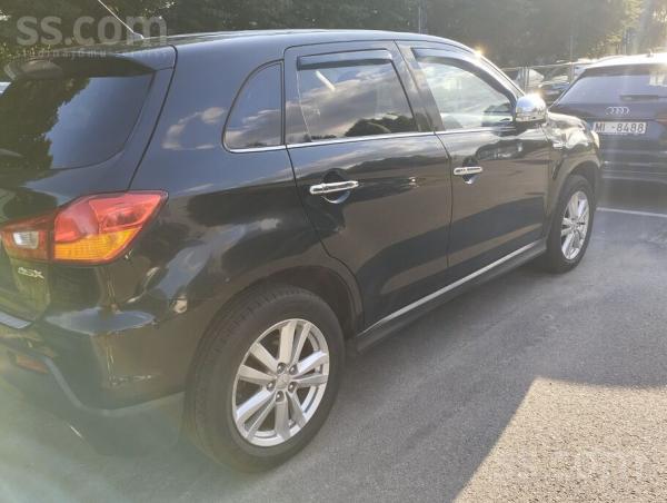 Melns Mitsubishi ASX 2010 Rīga, ar dzinēja tilpumu 1.80 L un nobraukumu 176 tūkst. km par 4900 €, foto 2 vietnē AUTOMOTO.COM.LV