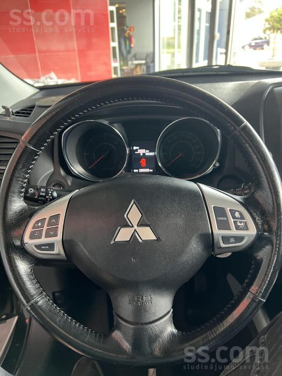 Melns Mitsubishi ASX 2012 Jēkabpils, ar dzinēja tilpumu 1.80 L un nobraukumu 297 tūkst. km par 4200 €, foto 14 vietnē AUTOMOTO.COM.LV
