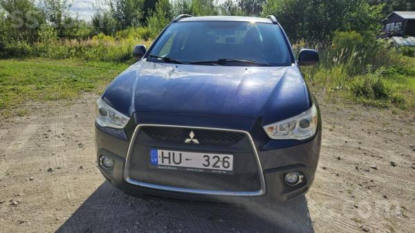 Zils Mitsubishi ASX 2011 Rīga, ar dzinēja tilpumu 1.60 L un nobraukumu 250 tūkst. km par 2800 €, foto 2 vietnē AUTOMOTO.COM.LV