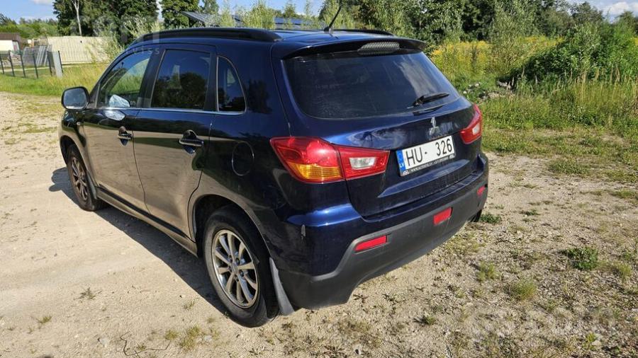 Blue Mitsubishi ASX 2011 in Riga, with an engine capacity of 1.60 L and mileage of 250 thousand km for 2800 €, photo 10 on AUTOMOTO.COM.LV
