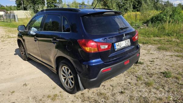 Zils Mitsubishi ASX 2011 Rīga, ar dzinēja tilpumu 1.60 L un nobraukumu 250 tūkst. km par 2800 €, foto 9 vietnē AUTOMOTO.COM.LV
