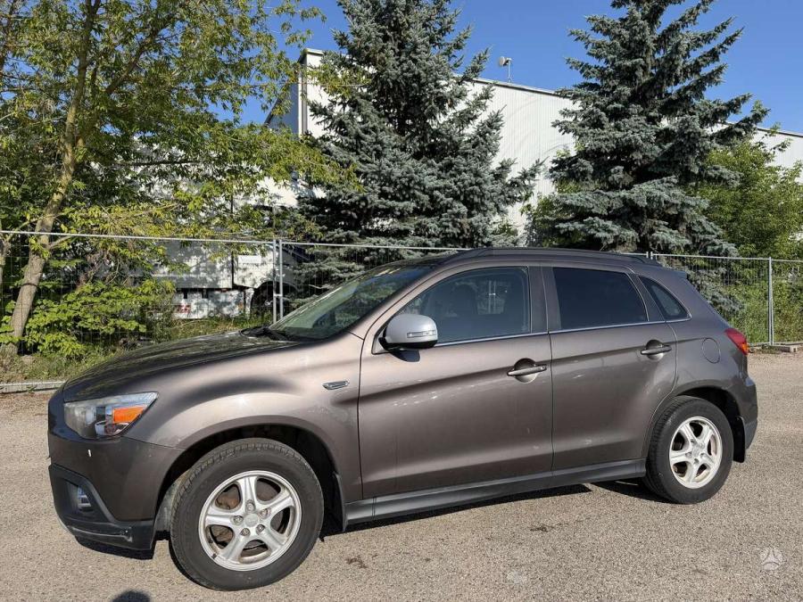 Brūns Mitsubishi ASX 2010 Marijampole, ar dzinēja tilpumu 1.80 L un nobraukumu 225 tūkst. km par 2950 €, foto 3 vietnē AUTOMOTO.COM.LV