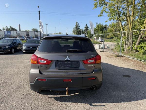 Brūns Mitsubishi ASX 2010 Marijampole, ar dzinēja tilpumu 1.80 L un nobraukumu 225 tūkst. km par 2950 €, foto 5 vietnē AUTOMOTO.COM.LV