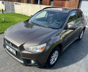 Brown Mitsubishi ASX 2011 in Vilnius, with an engine capacity of 1.60 L and mileage of 287 thousand km for 2000 €, photo 3 on AUTOMOTO.COM.LV