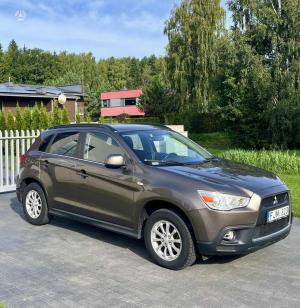 Brown Mitsubishi ASX 2011 in Vilnius, with an engine capacity of 1.60 L and mileage of 287 thousand km for 2000 €, photo 5 on AUTOMOTO.COM.LV
