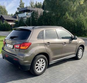 Brown Mitsubishi ASX 2011 in Vilnius, with an engine capacity of 1.60 L and mileage of 287 thousand km for 2000 €, photo 10 on AUTOMOTO.COM.LV