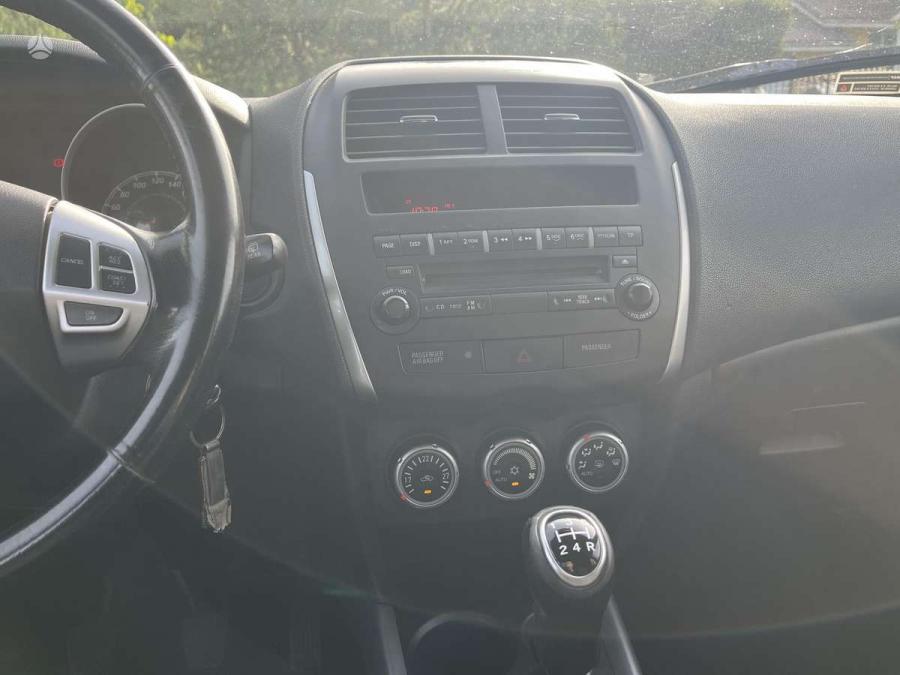 Brown Mitsubishi ASX 2011 in Vilnius, with an engine capacity of 1.60 L and mileage of 287 thousand km for 2000 €, photo 14 on AUTOMOTO.COM.LV