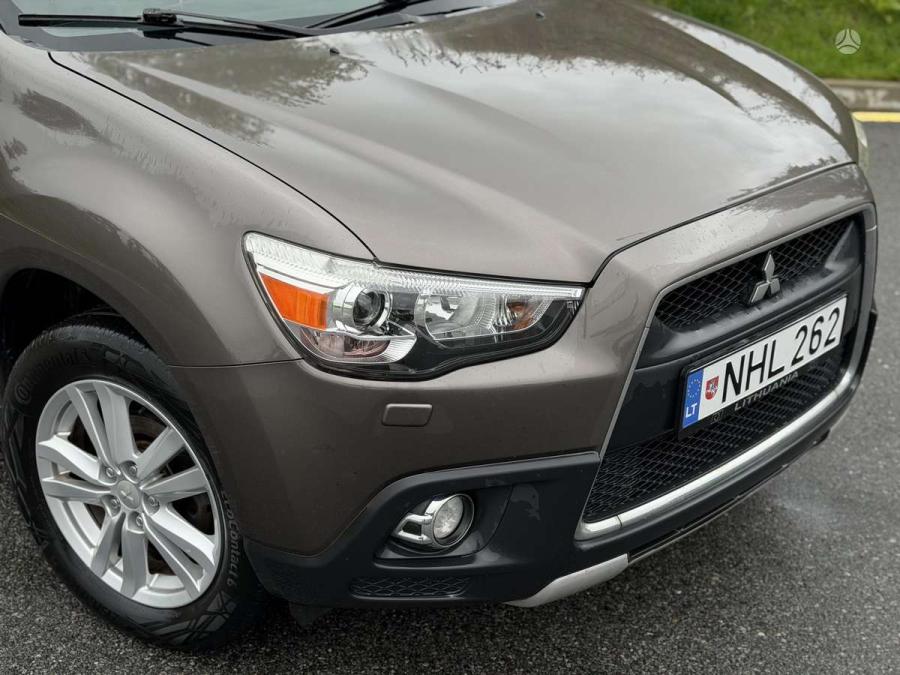 Brūns Mitsubishi ASX 2011 Viļņa, ar dzinēja tilpumu 1.80 L un nobraukumu 218 tūkst. km par 3600 €, foto 8 vietnē AUTOMOTO.COM.LV