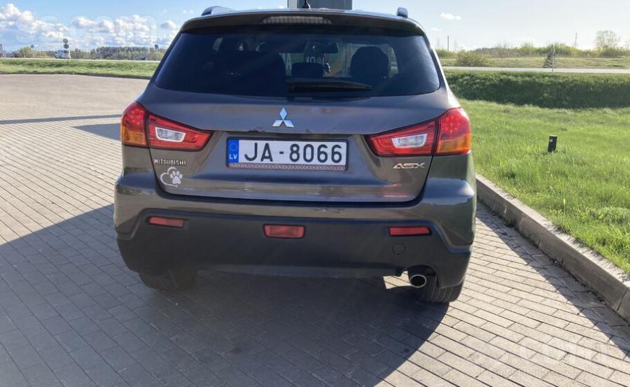 Brūns Mitsubishi ASX 2012 Rīga, ar dzinēja tilpumu 1.60 L un nobraukumu 200 tūkst. km par 5300 €, foto 5 vietnē AUTOMOTO.COM.LV