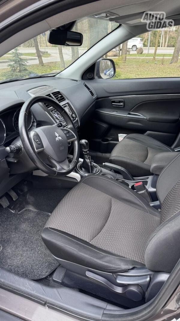Brūns Mitsubishi ASX 2013 Viļņa, ar dzinēja tilpumu 1.80 L un nobraukumu 119 tūkst. km par 4500 €, foto 5 vietnē AUTOMOTO.COM.LV