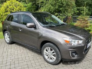 Grey Mitsubishi ASX 2013 in Ogre, with an engine capacity of 2.20 L and mileage of 211 thousand km for 7900 €, photo 5 on AUTOMOTO.COM.LV