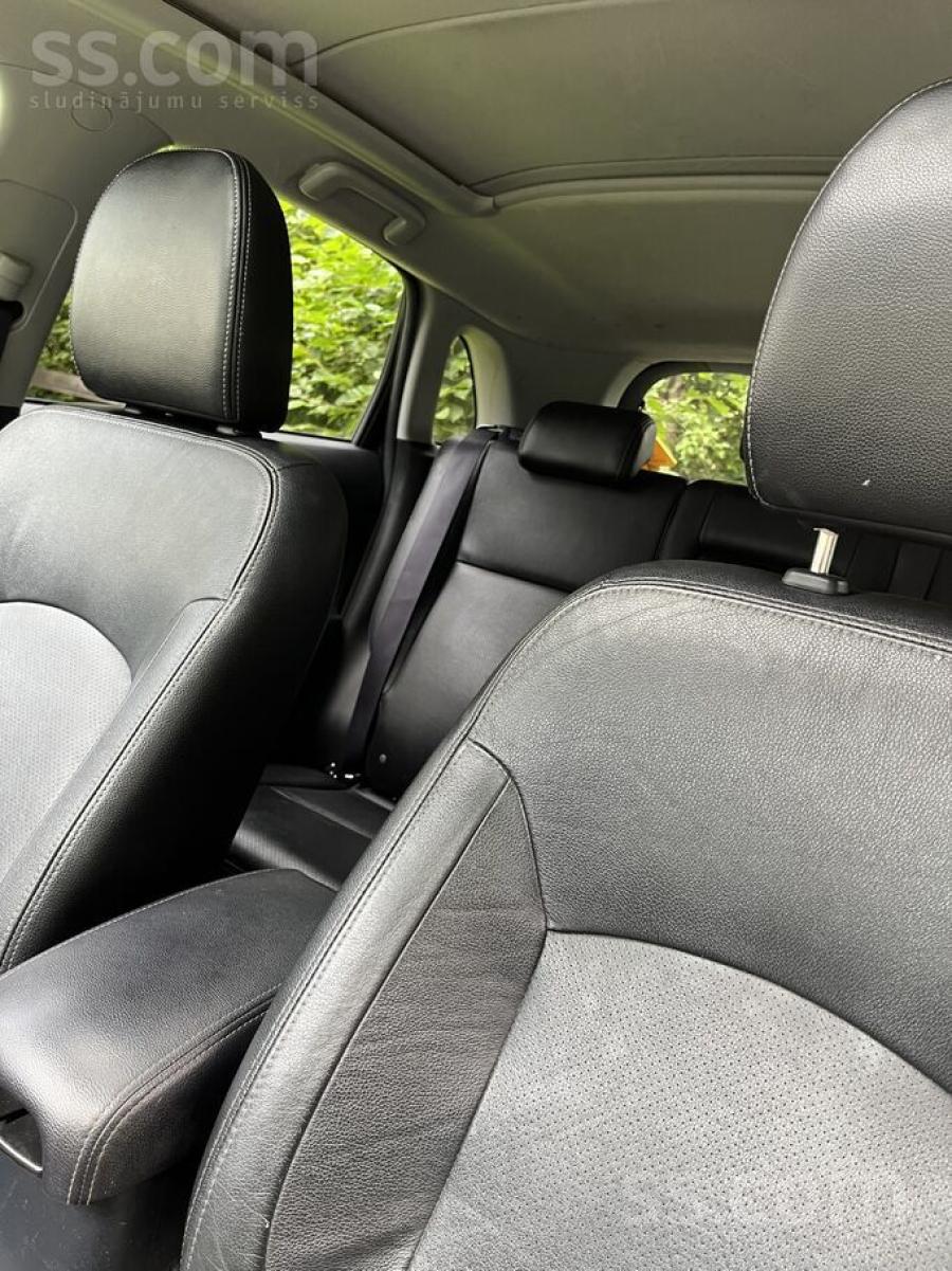 Grey Mitsubishi ASX 2013 in Ogre, with an engine capacity of 2.20 L and mileage of 211 thousand km for 7900 €, photo 12 on AUTOMOTO.COM.LV