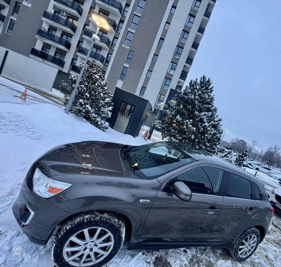 Brown Mitsubishi ASX 2014 in Vilnius, with an engine capacity of 0.00 L and mileage of 214 thousand km for 7950 €, photo 2 on AUTOMOTO.COM.LV