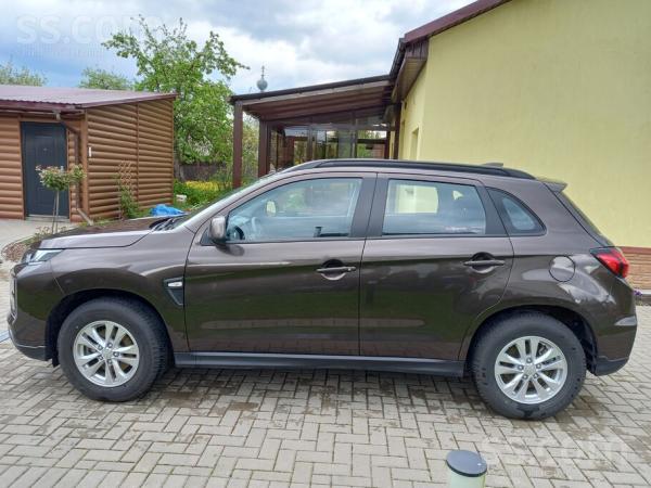 Brown Mitsubishi ASX 2021 in Preili, with an engine capacity of 2.00 L and mileage of 115 thousand km for 14999 €, photo 3 on AUTOMOTO.COM.LV