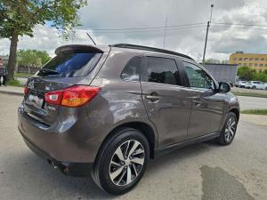 Brown Mitsubishi ASX 2015 in Siauliai, with an engine capacity of 1.80 L and mileage of 217 thousand km for 7450 €, photo 6 on AUTOMOTO.COM.LV