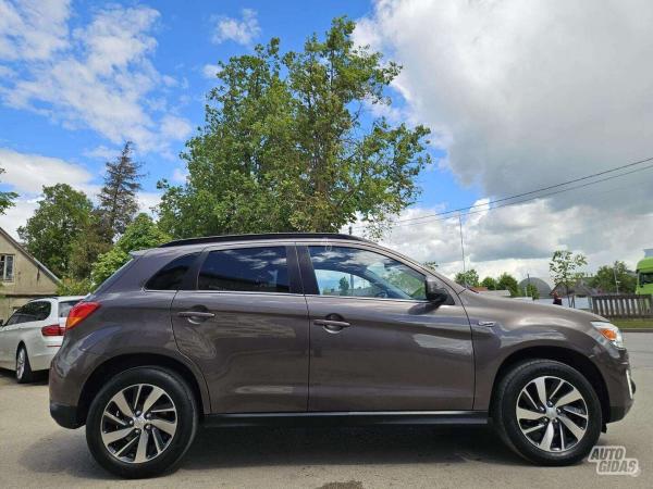 Brown Mitsubishi ASX 2015 in Siauliai, with an engine capacity of 1.80 L and mileage of 217 thousand km for 7450 €, photo 6 on AUTOMOTO.COM.LV