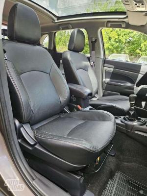Brown Mitsubishi ASX 2015 in Siauliai, with an engine capacity of 1.80 L and mileage of 217 thousand km for 7450 €, photo 21 on AUTOMOTO.COM.LV
