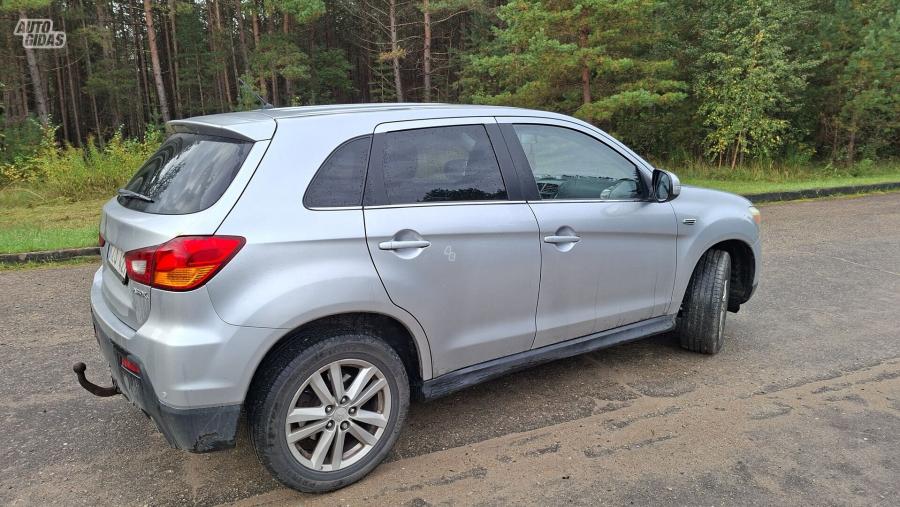Pelēks Mitsubishi ASX 2010 Šauļi, ar dzinēja tilpumu 1.80 L un nobraukumu 308 tūkst. km par 3250 €, foto 10 vietnē AUTOMOTO.COM.LV