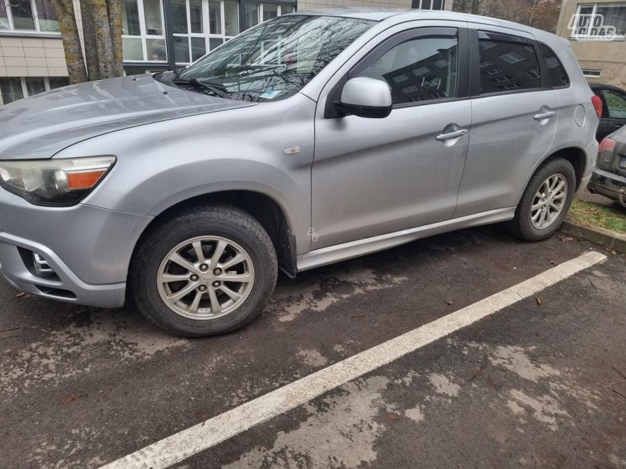 Pelēks Mitsubishi ASX 2011 Alīta, ar dzinēja tilpumu 2.00 L un nobraukumu 210 tūkst. km par 4150 €, foto 3 vietnē AUTOMOTO.COM.LV