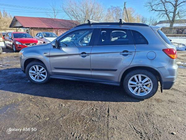 Grey Mitsubishi ASX 2011 in Pasvalys, with an engine capacity of 1.80 L and mileage of 303 thousand km for 2750 €, photo 9 on AUTOMOTO.COM.LV
