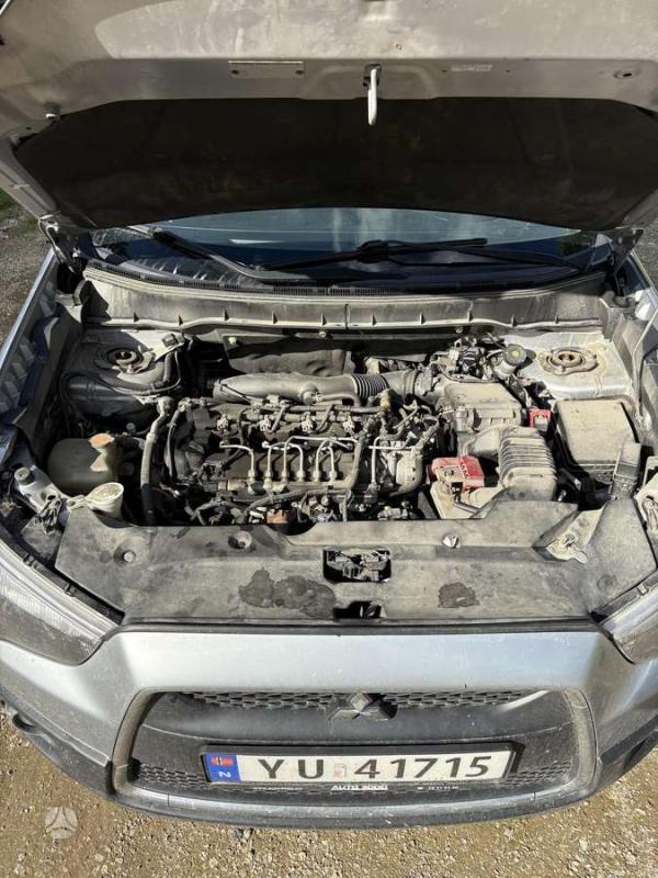 Grey Mitsubishi ASX 2011 in Panevezys, with an engine capacity of 1.80 L and mileage of 266 thousand km for 1700 €, photo 3 on AUTOMOTO.COM.LV