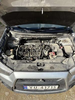 Grey Mitsubishi ASX 2011 in Panevezys, with an engine capacity of 1.80 L and mileage of 266 thousand km for 1700 €, photo 3 on AUTOMOTO.COM.LV