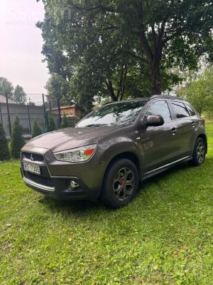 Grey Mitsubishi ASX 2011 in Riga, with an engine capacity of 1.60 L and mileage of 184 thousand km for 5100 €, photo 9 on AUTOMOTO.COM.LV