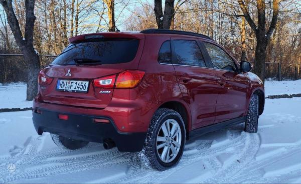 Red Mitsubishi ASX 2010 in Siauliai, with an engine capacity of 1.80 L and mileage of 258 thousand km for 5300 €, photo 5 on AUTOMOTO.COM.LV