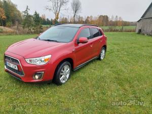 Sarkans Mitsubishi ASX 2013 Viljandi, ar dzinēja tilpumu 2.30 L un nobraukumu 83 tūkst. km par 12000 €, foto 3 vietnē AUTOMOTO.COM.LV